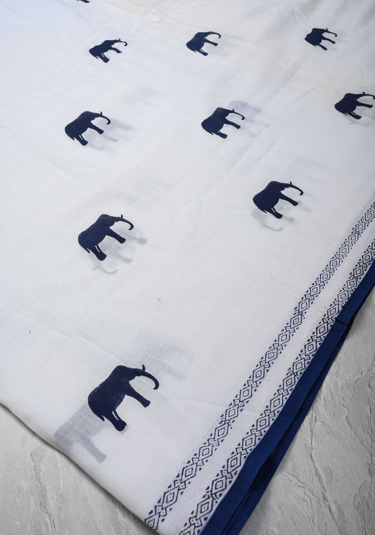 White Uppada Cotton Saree with Elephant Block Buttas and Contrast Bord ...